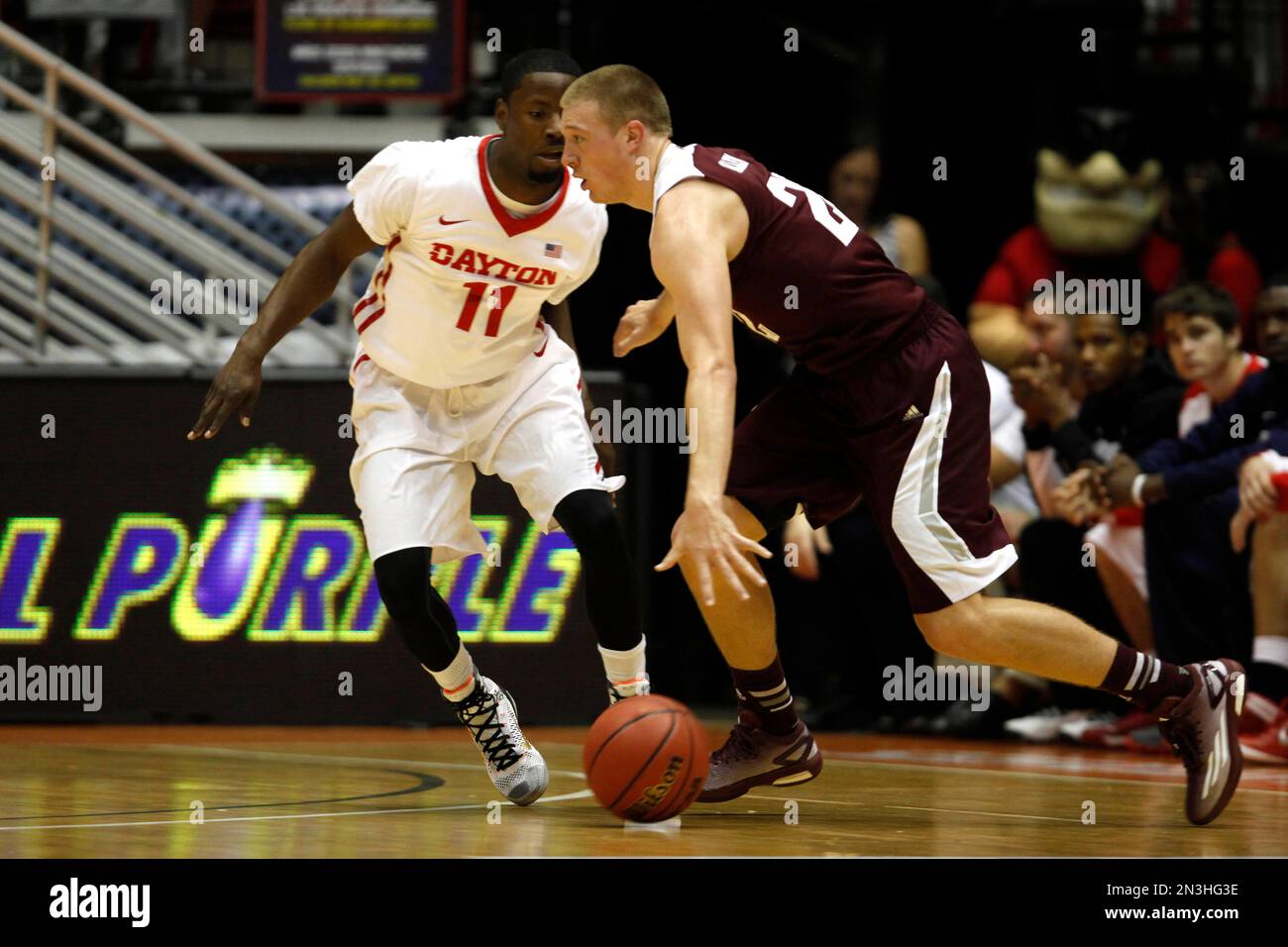 Texas A&M guard Peyton Allen, right, dribbles against Dayton guard ...