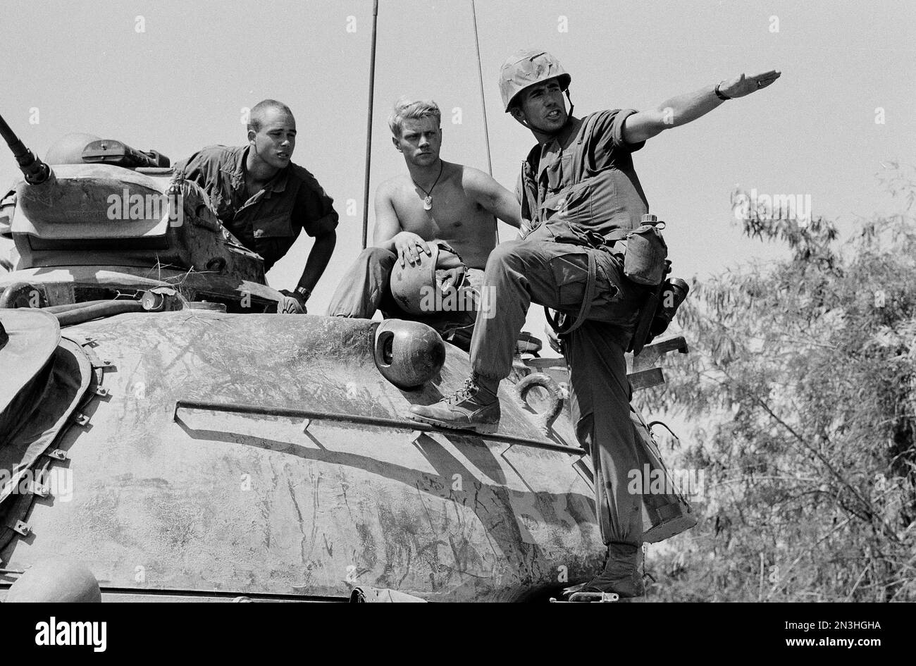 A strategy session commands the attention of Marine Capt. Charles Robb ...