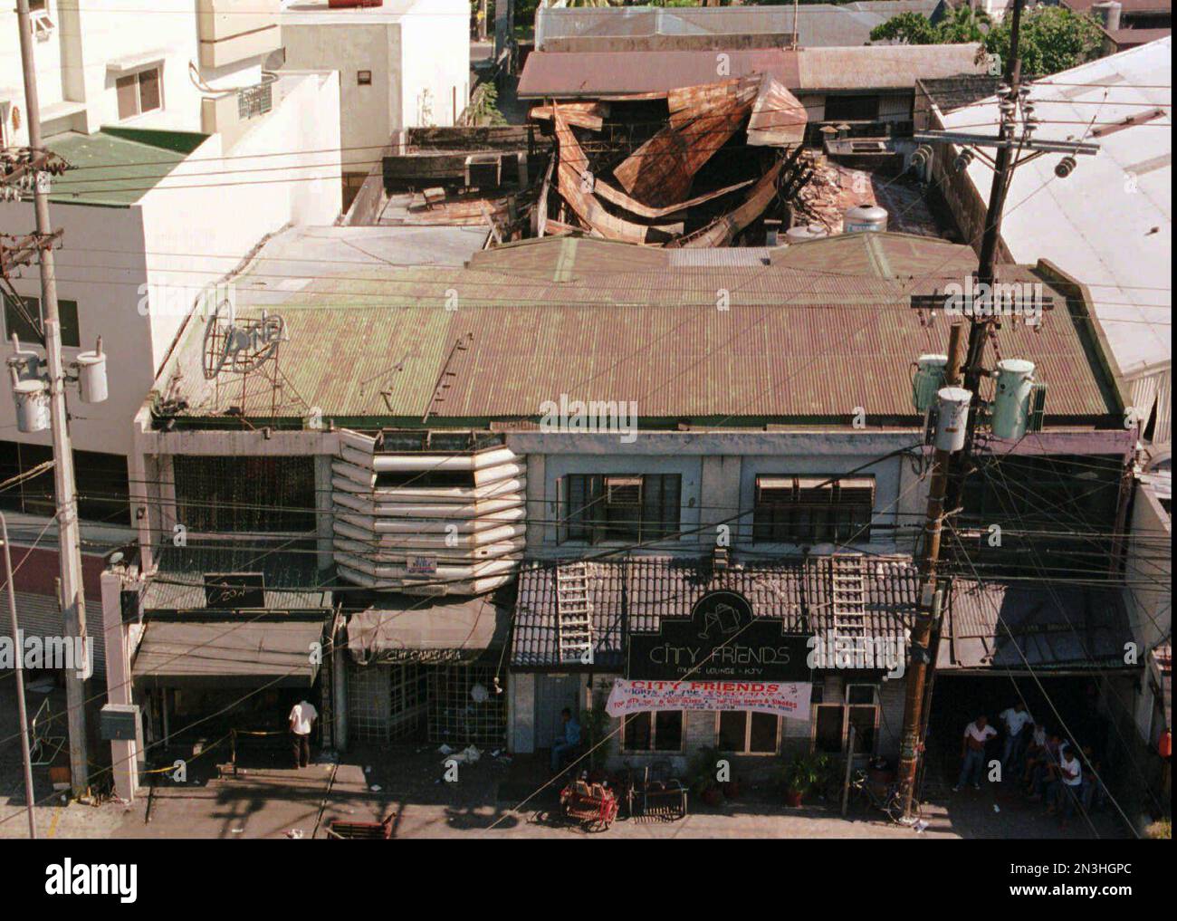 FILE - This March 20, 1996 file photo shows an apartment building which ...