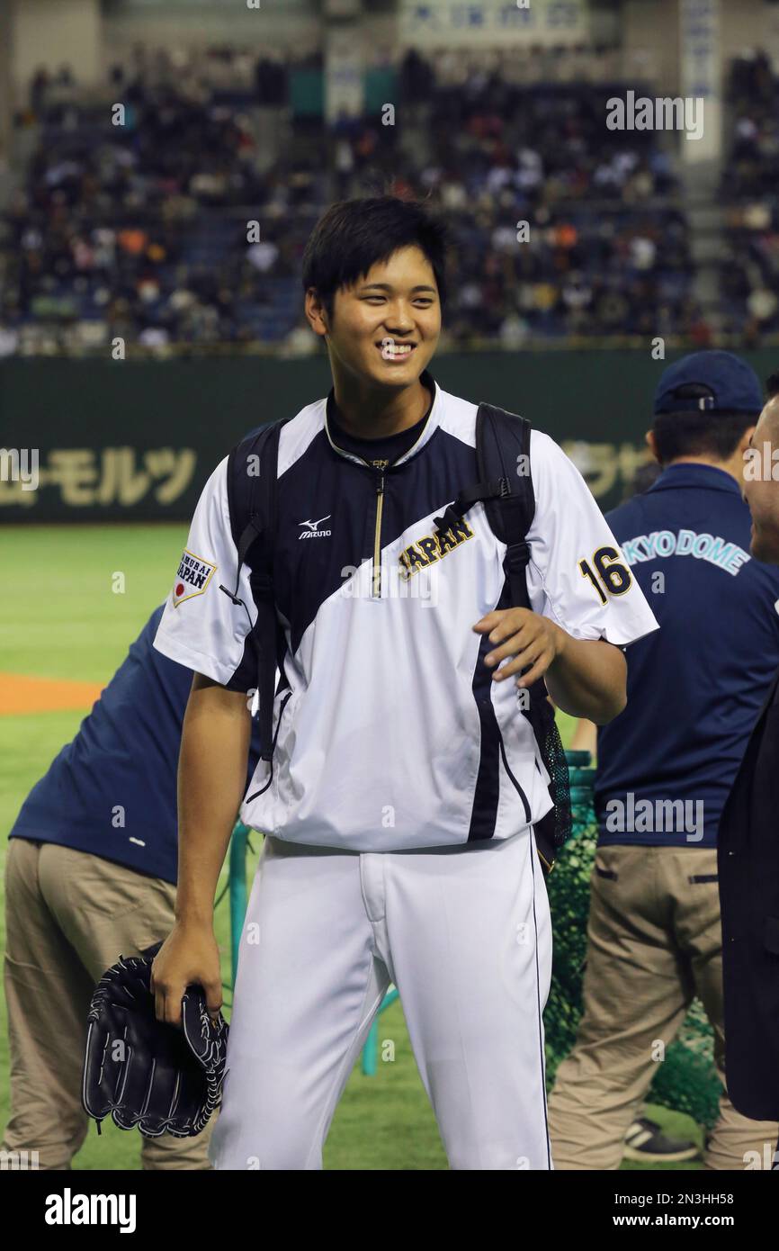 Japan's pitcher Shohei Otani smiles after workout for Game 4 against ...