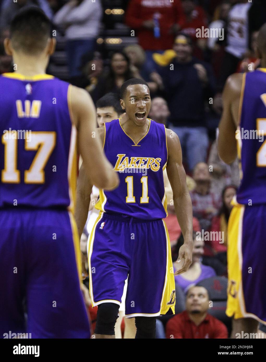 Los Angeles Lakers' Wesley Johnson (11) celebrates after making a ...
