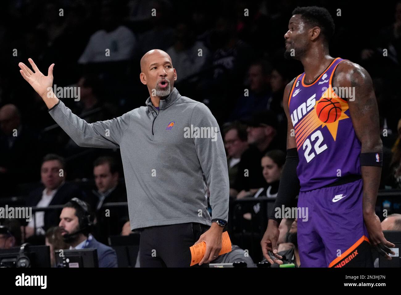 Phoenix Suns head coach Monty Williams talks to center Deandre Ayton ...