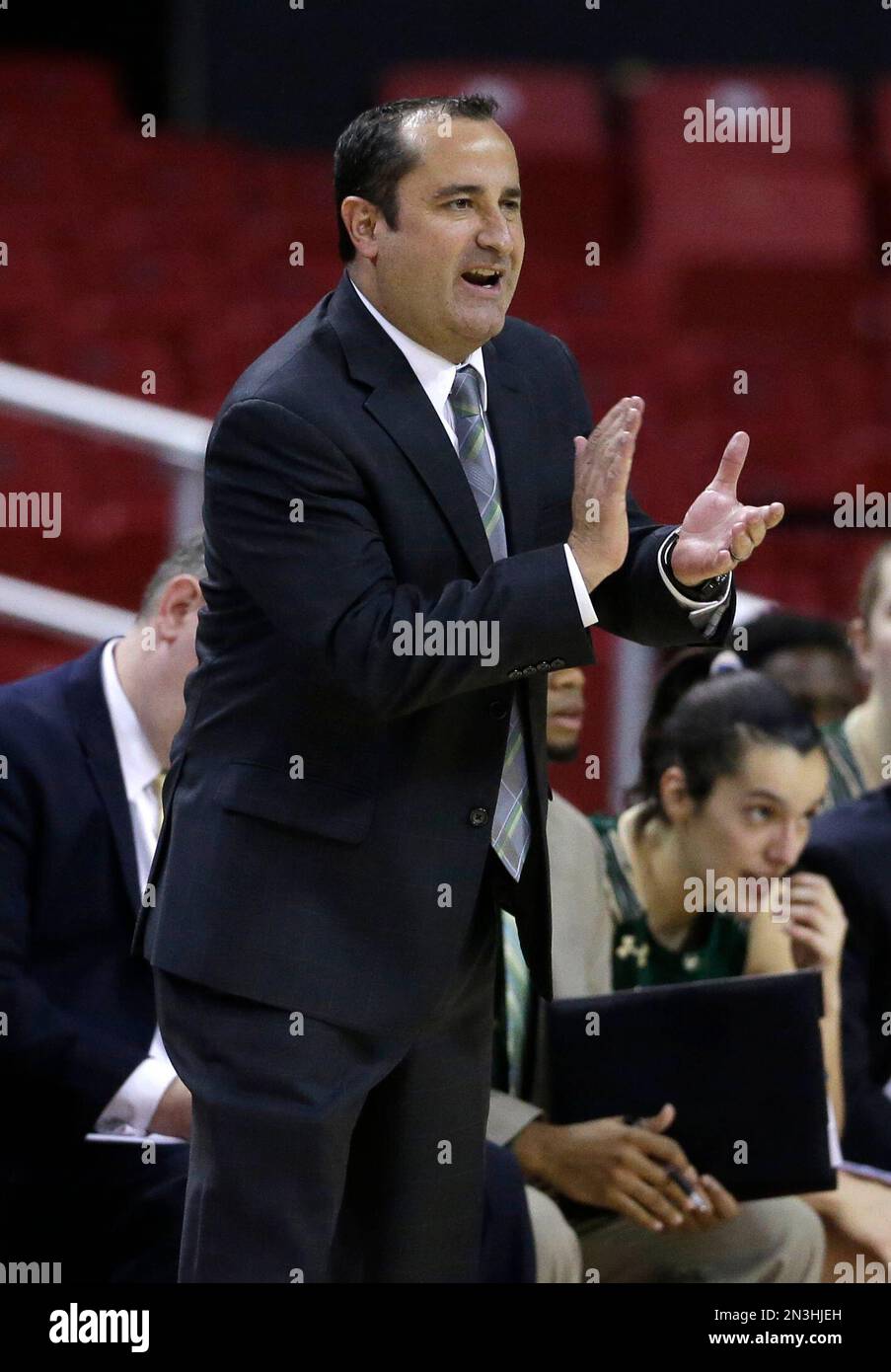 South Florida head coach Jose Fernandez directs his players during an ...