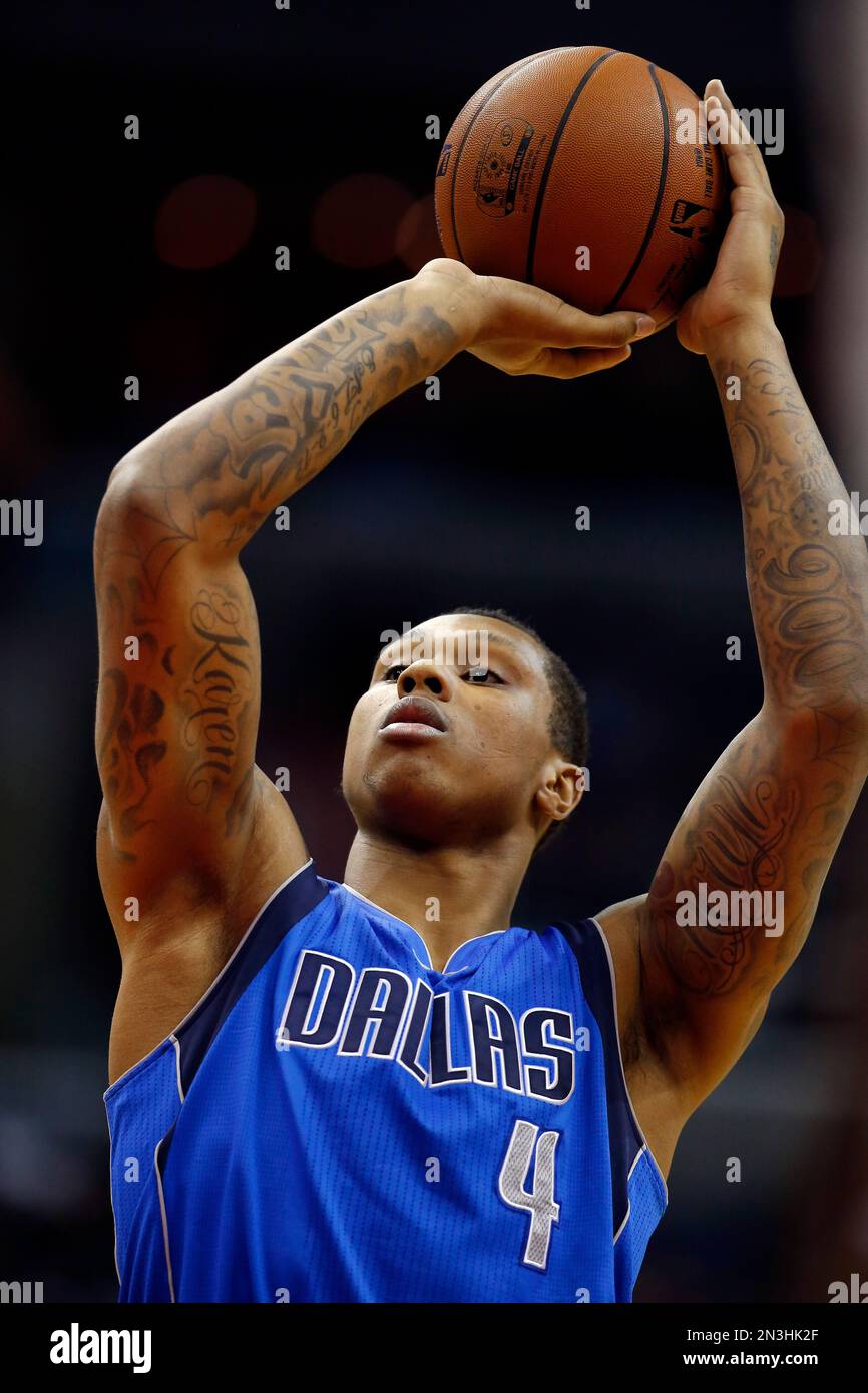 Dallas Mavericks forward Greg Smith (4) shoots a free throw in the ...