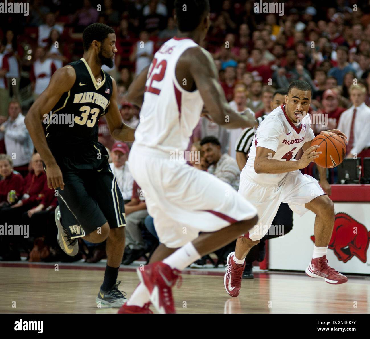 Arkansas' Jabril Durham (4) drives the ball by Wake Forest's Aaron ...