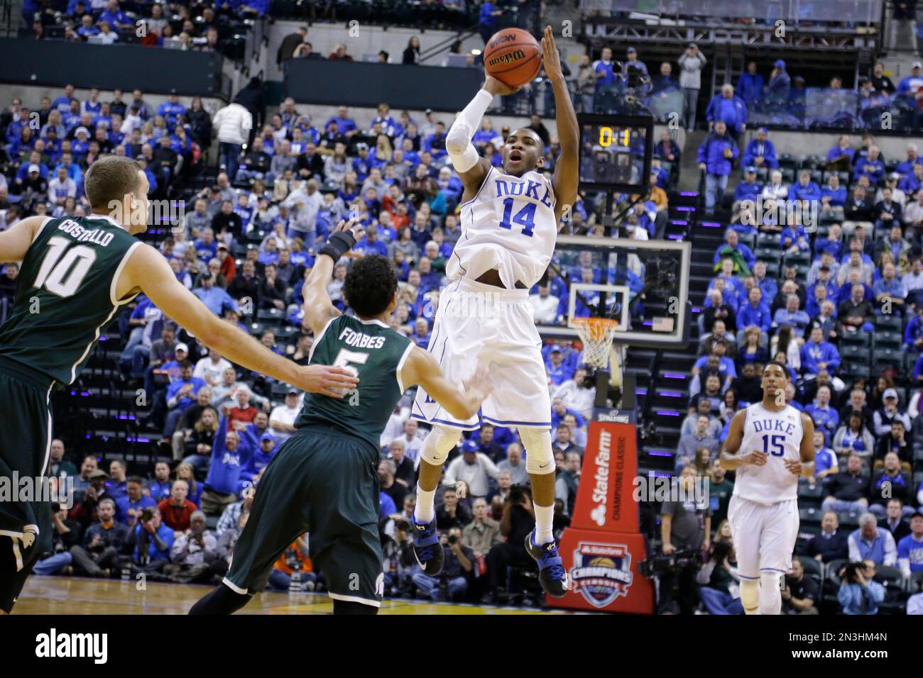 Duke's Rasheed Sulaimon shoots over Michigan State's Bryn Forbes in the ...