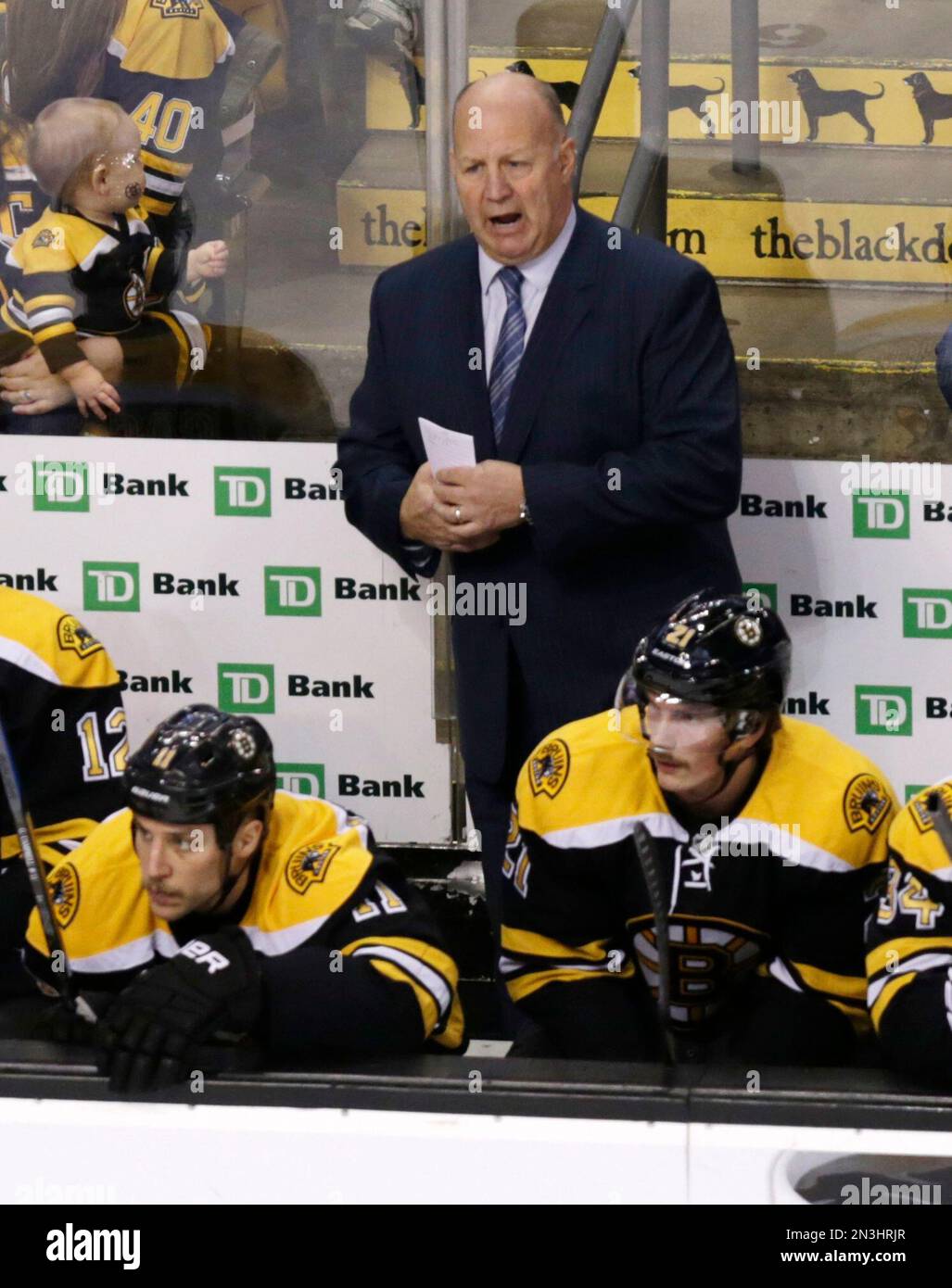 Boston Bruins head coach Claude Julien calls to his players during the ...