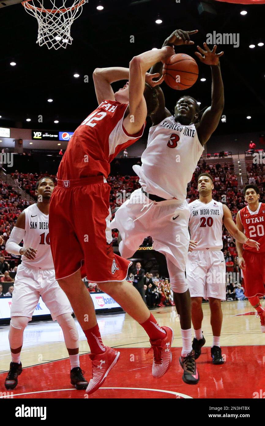 Utah forward Jakob Poeltl is fouled by San Diego State forward Angelo ...