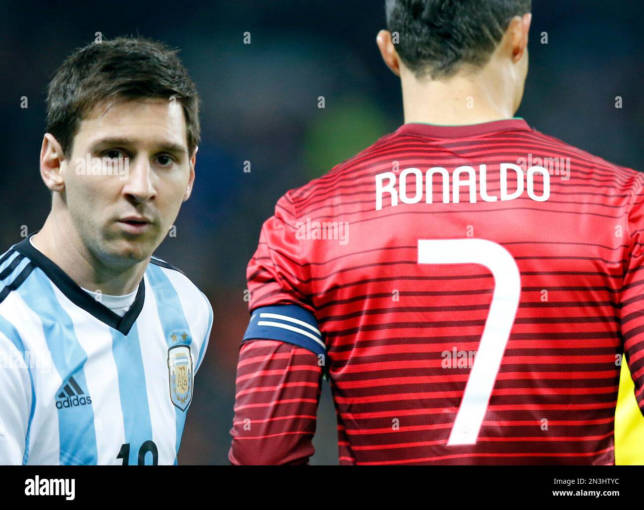 Lionel Messi of Argentina, left, stands next to Cristiano Ronaldo of ...