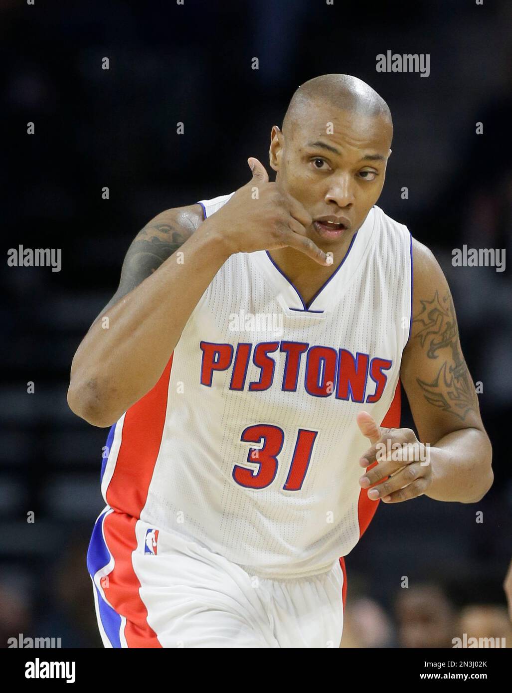 Detroit Pistons forward Caron Butler makes a sign after hitting a three ...