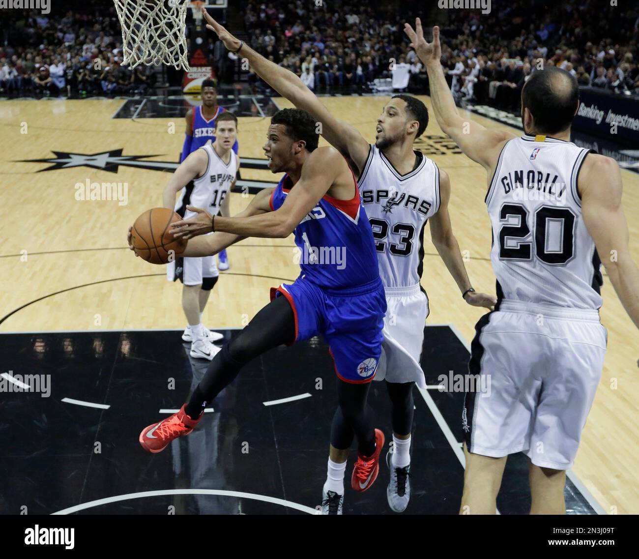 Philadelphia 76ers' Michael Carter-Williams (1) drives to the basket ...
