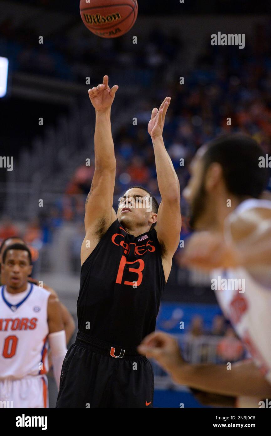 Miami guard Angel Rodriguez (13) for two of his game high 24 points ...