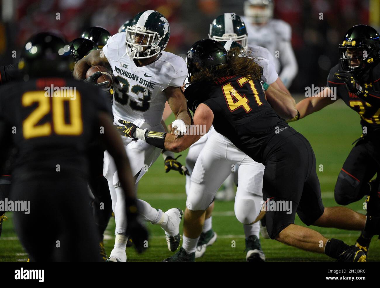 Michigan State running back Jeremy Langford (33) runs against Maryland ...