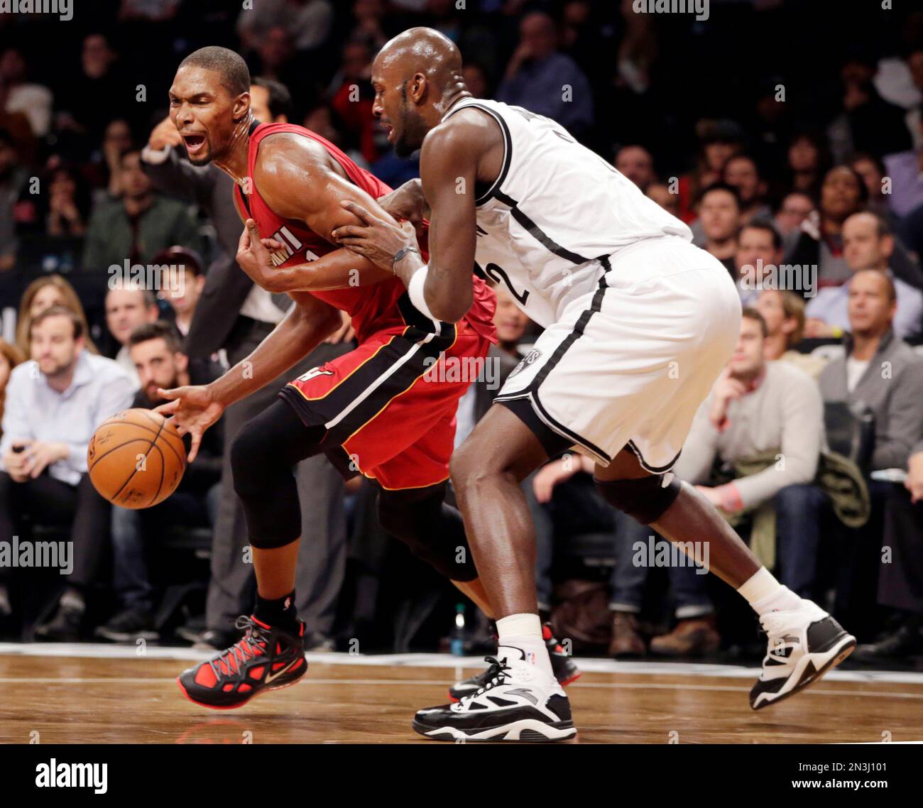 Brooklyn Nets forward Kevin Garnett (2) gets tangled up with Miami Heat ...