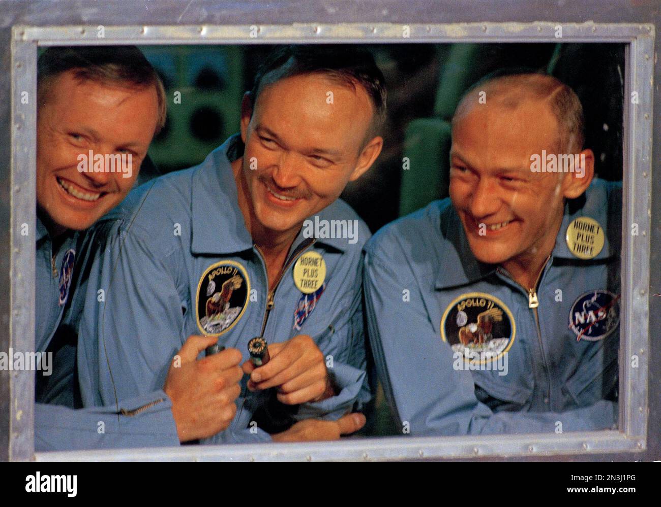 The three Apollo 11 astronauts, happy to be back on earth again after ...