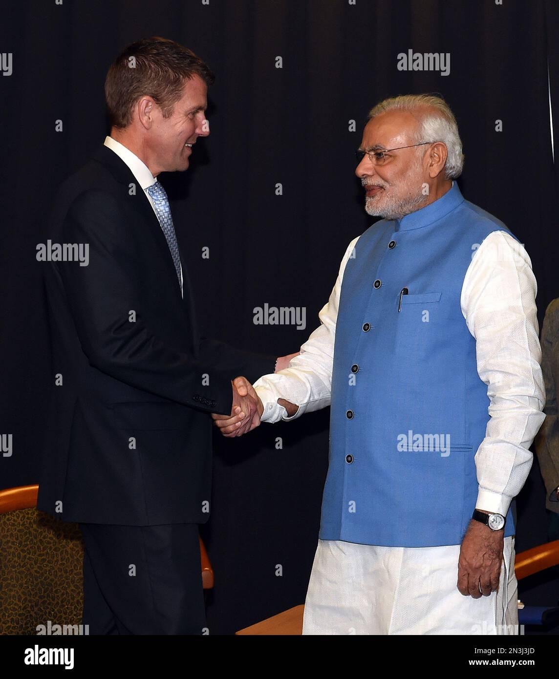 Prime Minster of India Narendra Modi, right, shakes hand with Australia ...