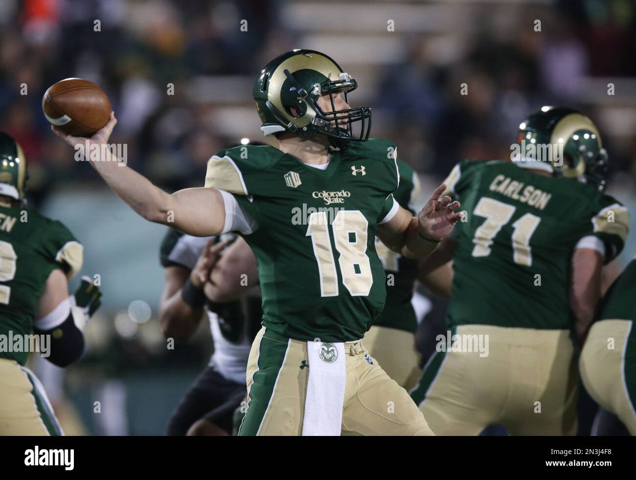 Colorado State quarterback Garrett Grayson looks to pass against Hawaii ...