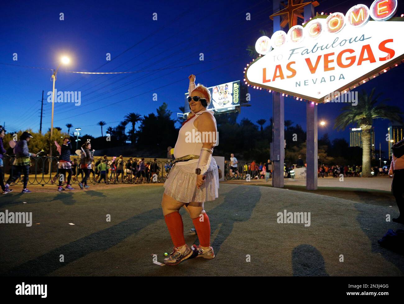 A runner stops for a quick picture during the Rock 'n' Roll Las Vegas ...
