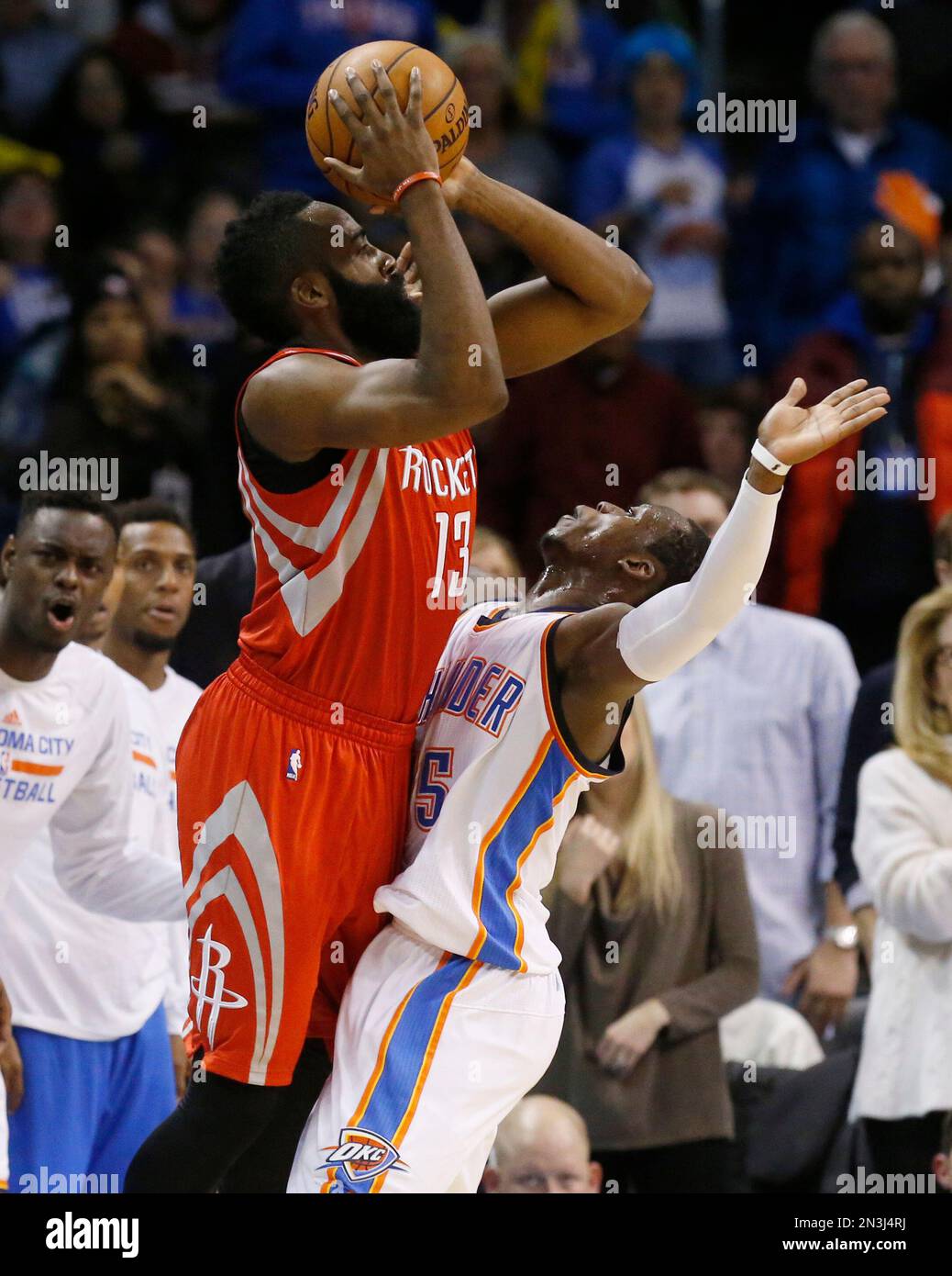 Houston Rockets' James Harden (13) shoots over Oklahoma City Thunder's ...