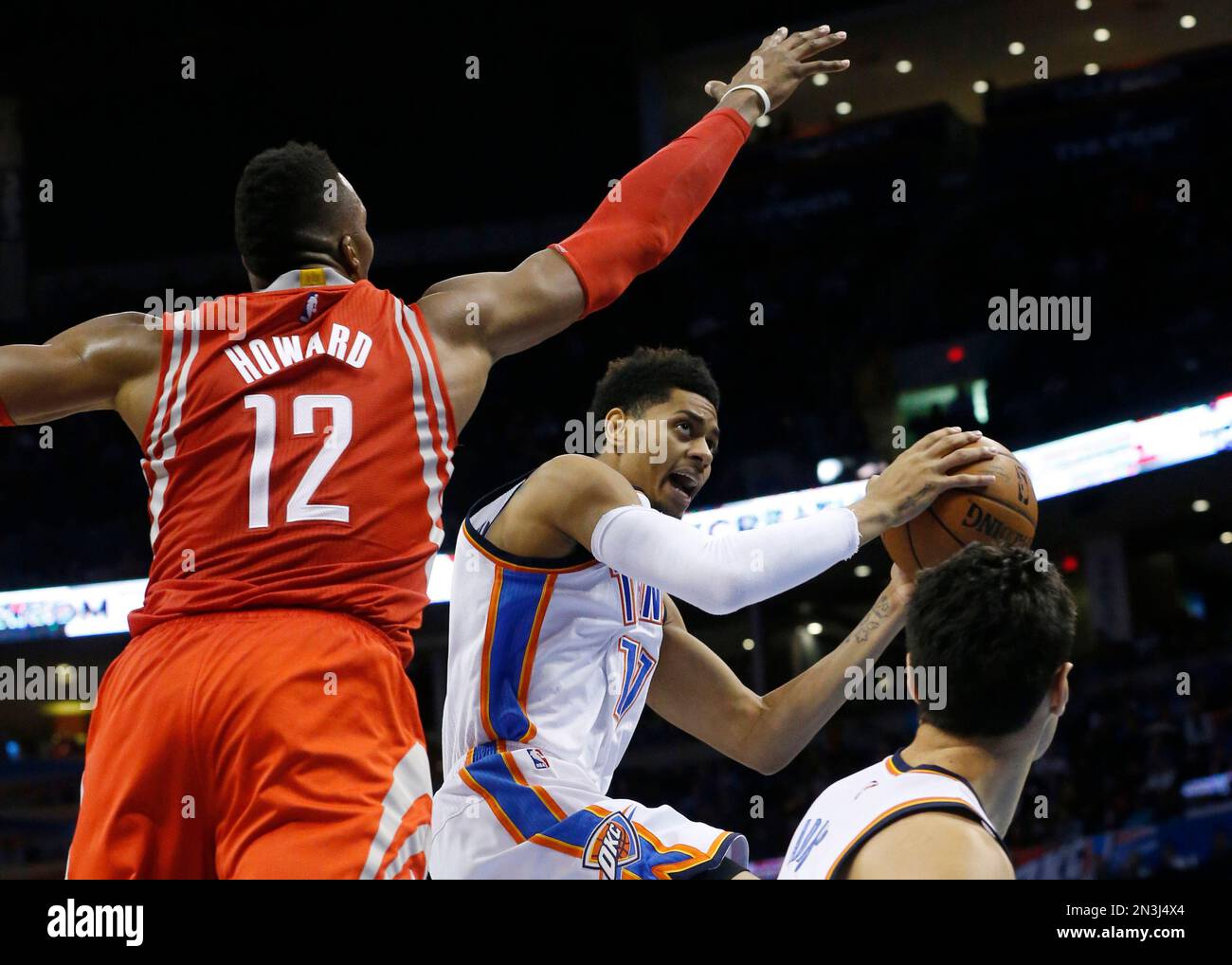 Oklahoma City Thunder's Jeremy Lamb (11) goes up for a shot in front of ...