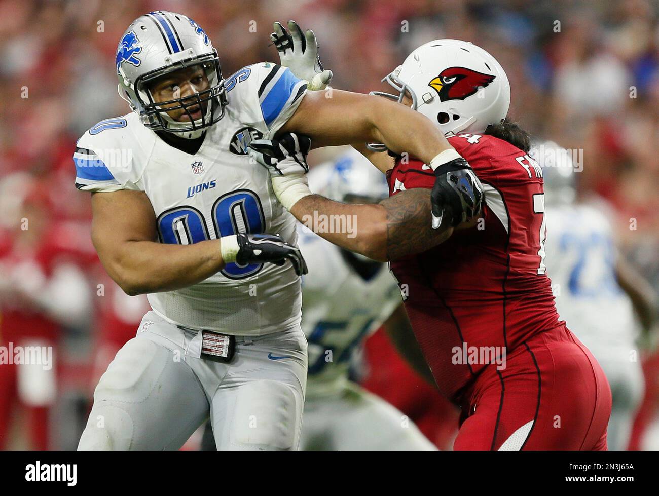 Detroit Lions defensive tackle Ndamukong Suh (90) battles Arizona ...