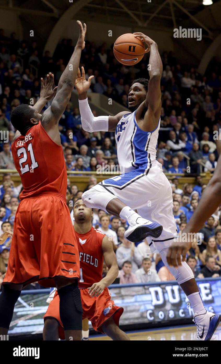 Duke's Justise Winslow (12) drives to the basket as Fairfield's Amadou ...
