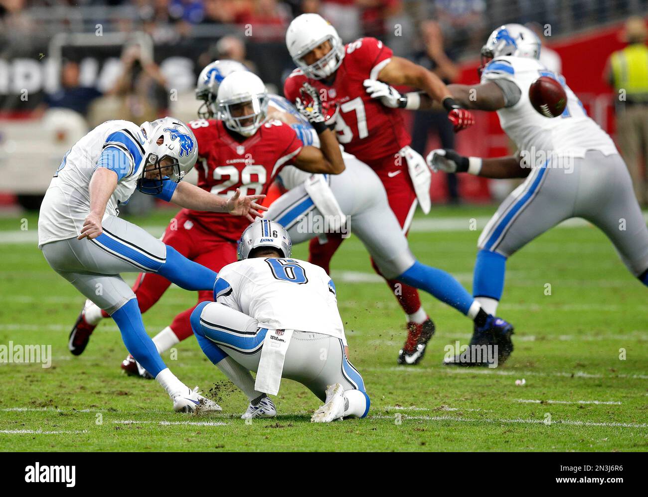 Detroit Lions kicker Matt Prater kicks a field goal against the Arizona ...