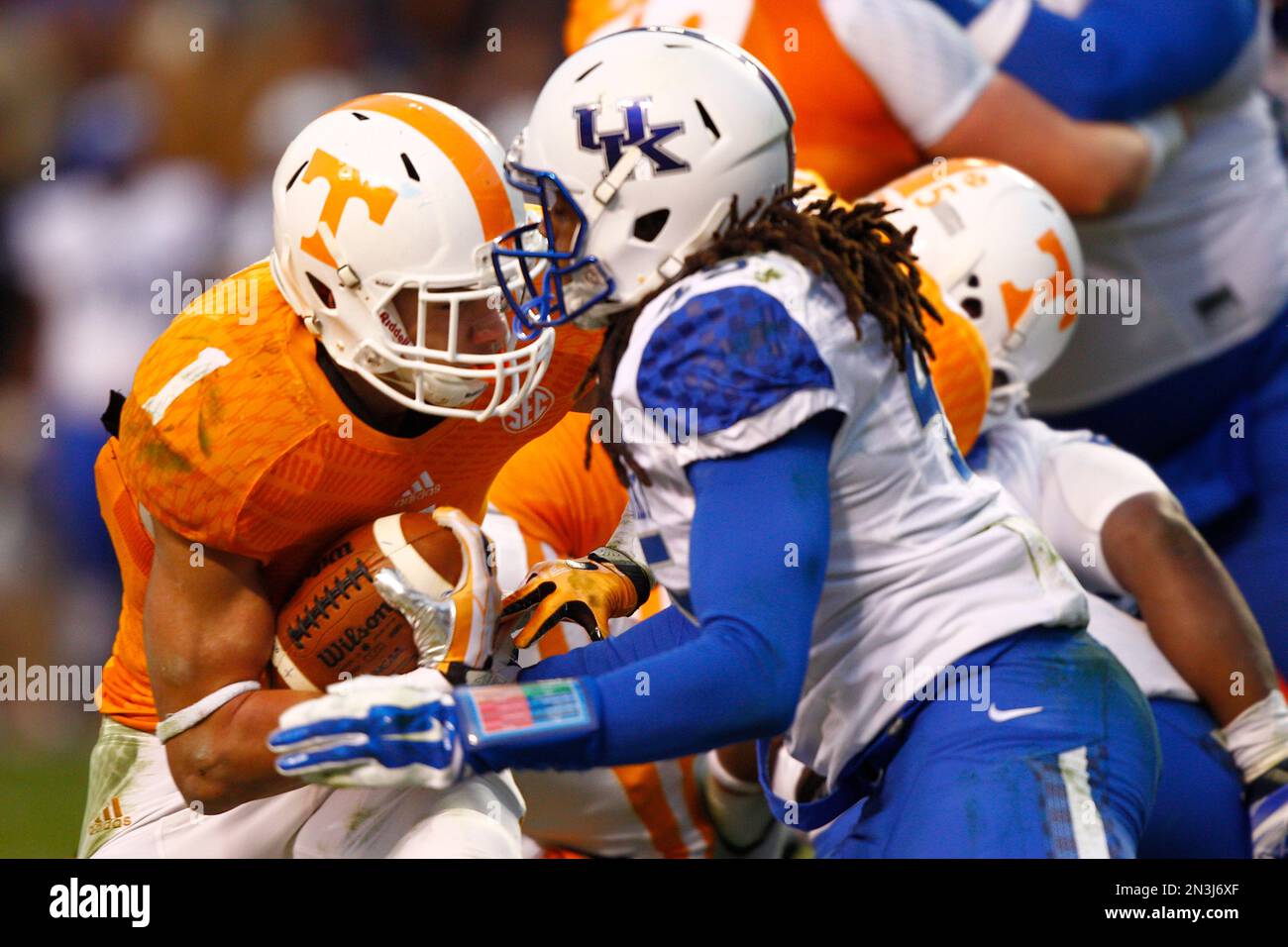 Tennessee running back Jalen Hurd (1) is hit by Kentucky linebacker ...
