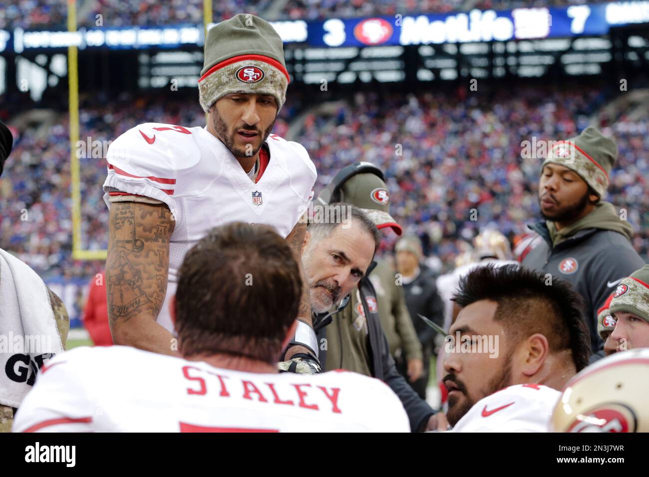 San Francisco 49ers quarterback Colin Kaepernick (7) talks to his ...