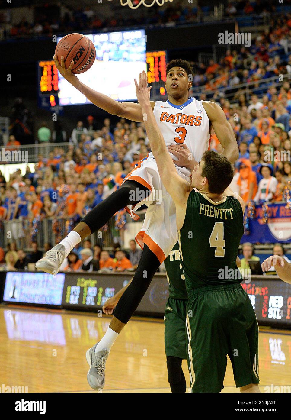 Florida forward Devin Robinson (3) goes up on William & Mary guard Omar ...