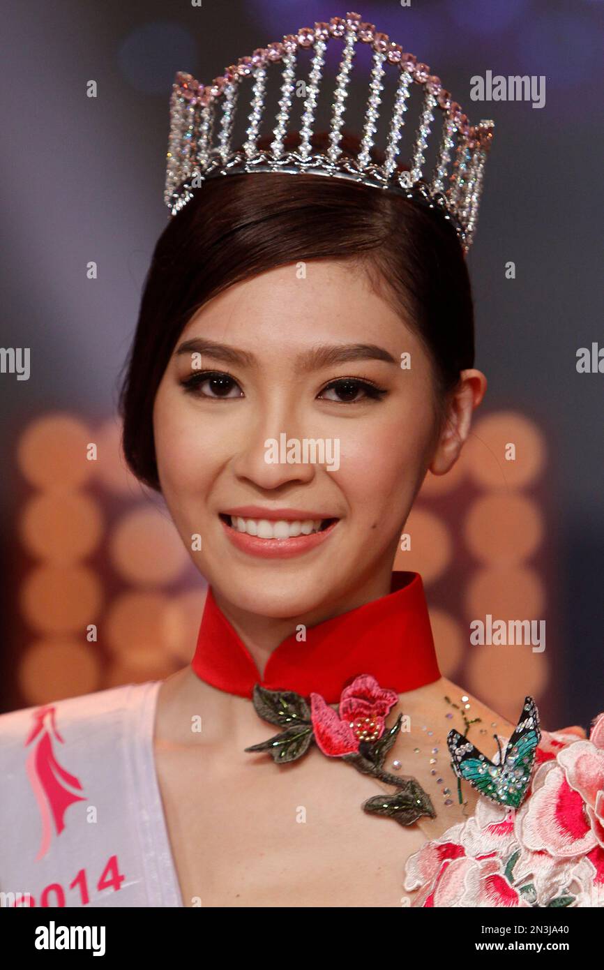 Anjoe Koh, 23, poses for photographers after winning the Miss Astro ...
