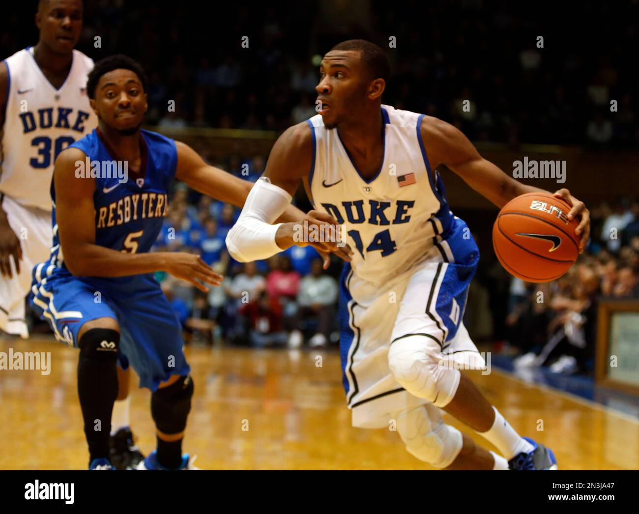 Duke's Rasheed Sulaimon (14) drives the ball around Presbyterian's ...