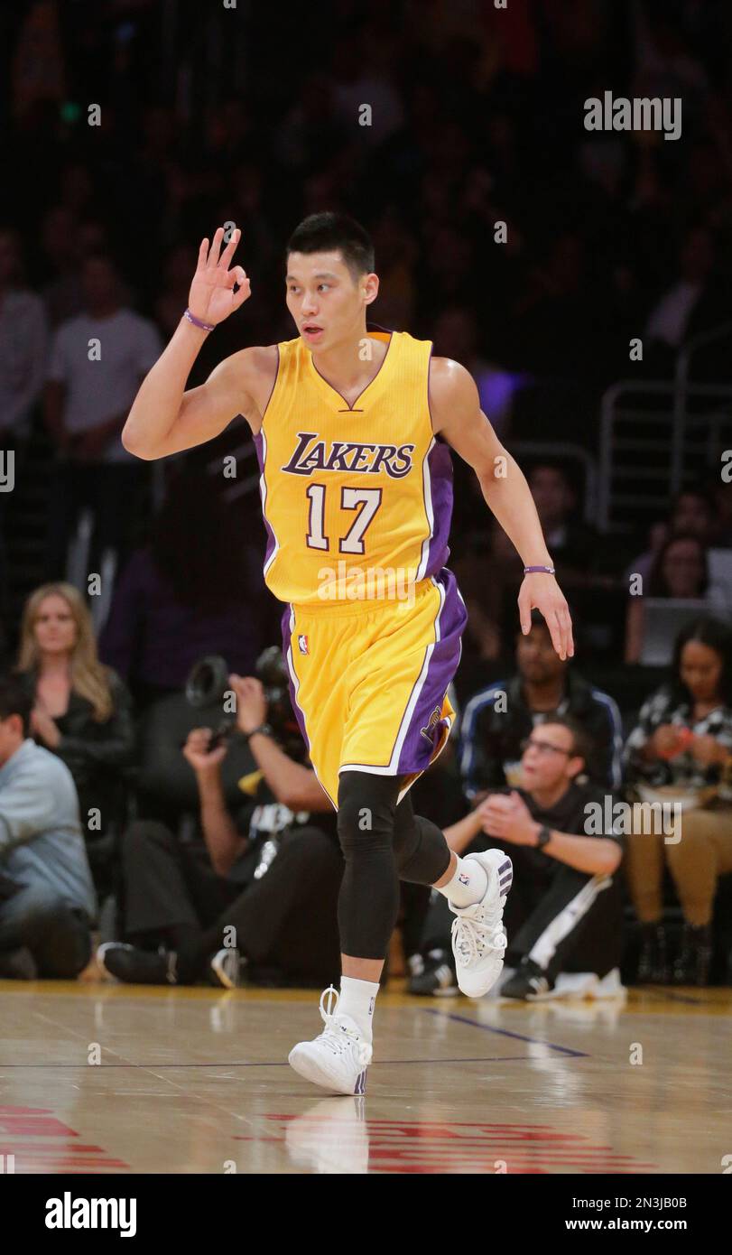 Los Angeles Lakers' Jeremy Lin reacts after making a three-point basket ...