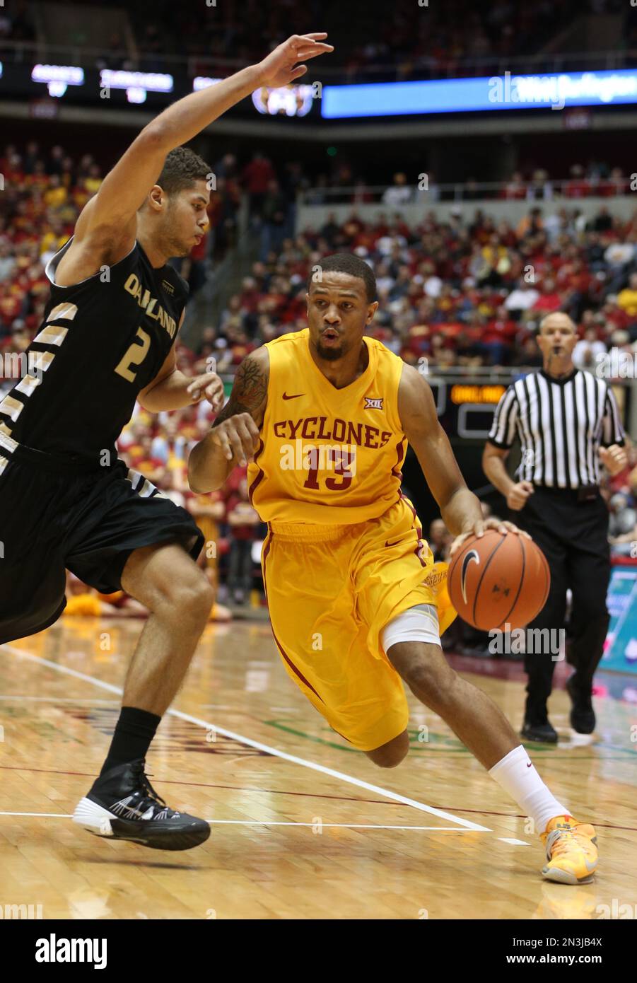 Iowa State guard Bryce Dejean-Jones, right, drives around Oakland ...