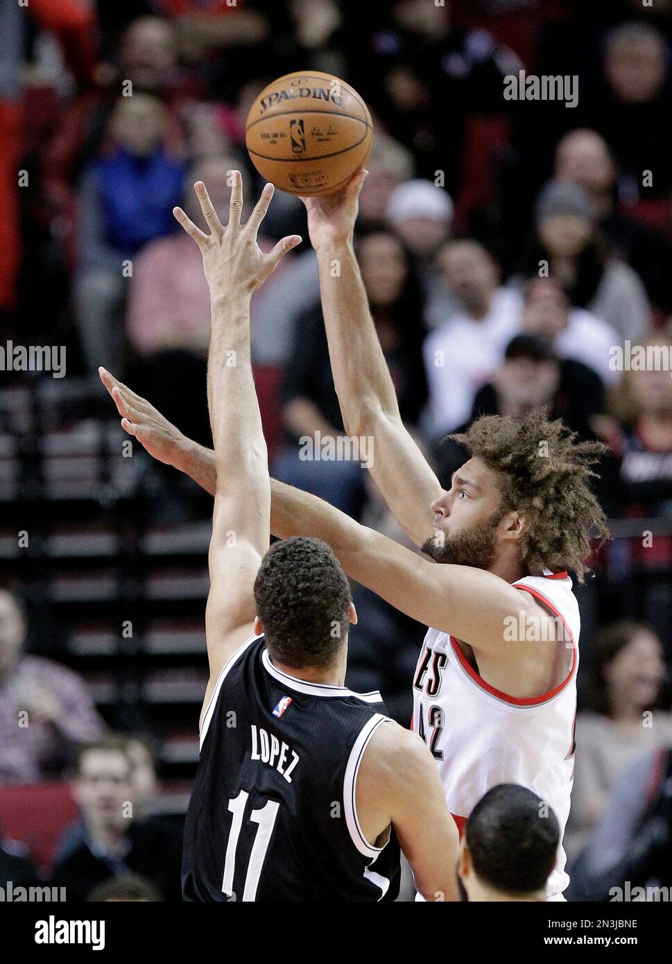 Portland Trail Blazers center Robin Lopez shoots over Brooklyn Nets ...