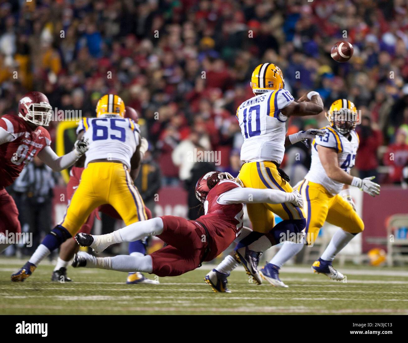 Arkansas linebacker Josh Williams (42) applies pressure to LSU ...