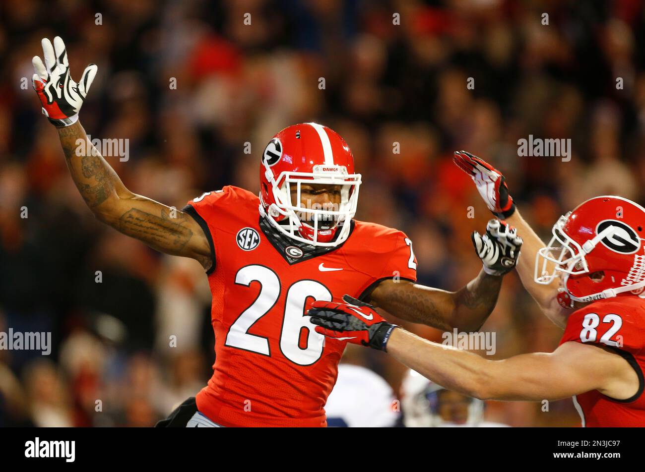 Georgia wide receiver Malcolm Mitchell (26) celebrates with Georgia ...