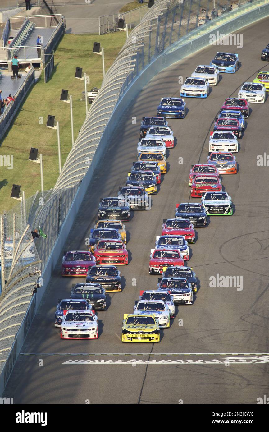 Cars begin the NASCAR Nationwide series auto race Saturday, Nov. 15 ...