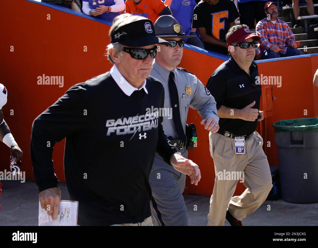 South Carolina head coach Steve Spurrier runs on the filed before the ...
