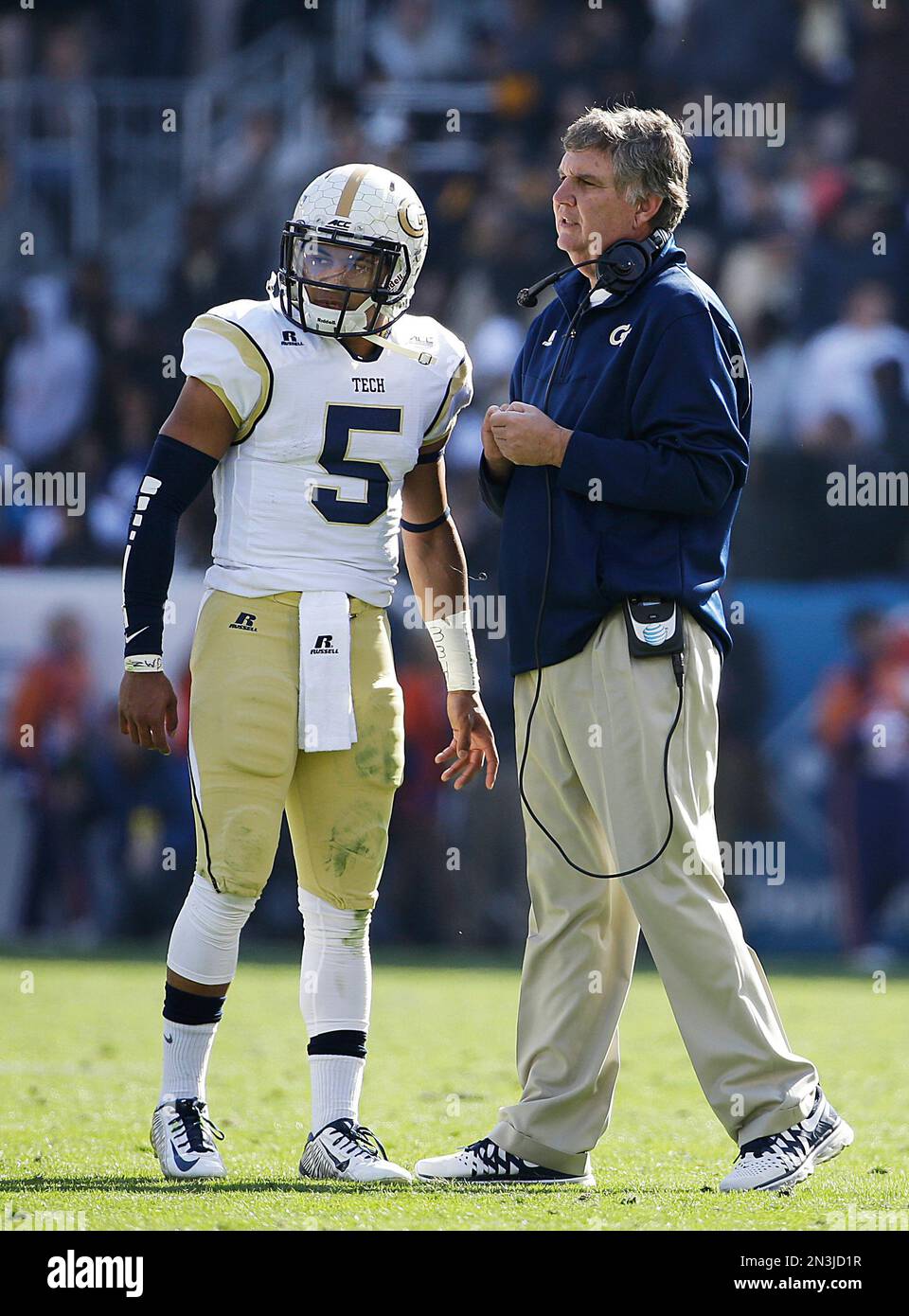 Georgia Tech head coach Paul Johnson, right, talks with quarterback ...