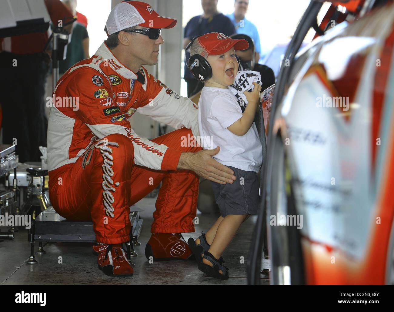 Kevin Harvick plays with his son, Keelan, in the garage, as Harvick ...