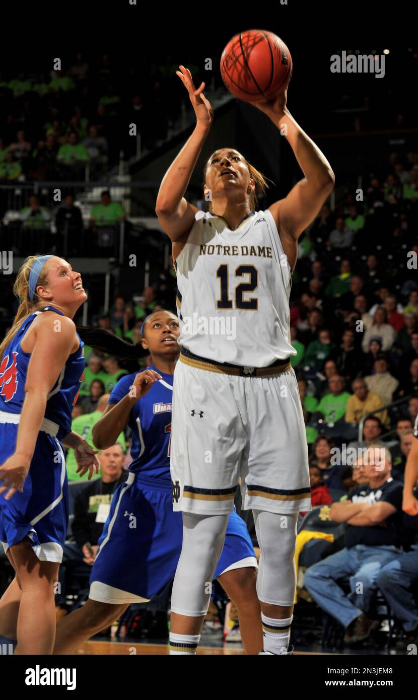 Notre Dame forward Taya Reimer puts a shot up over U Mass Lowell ...