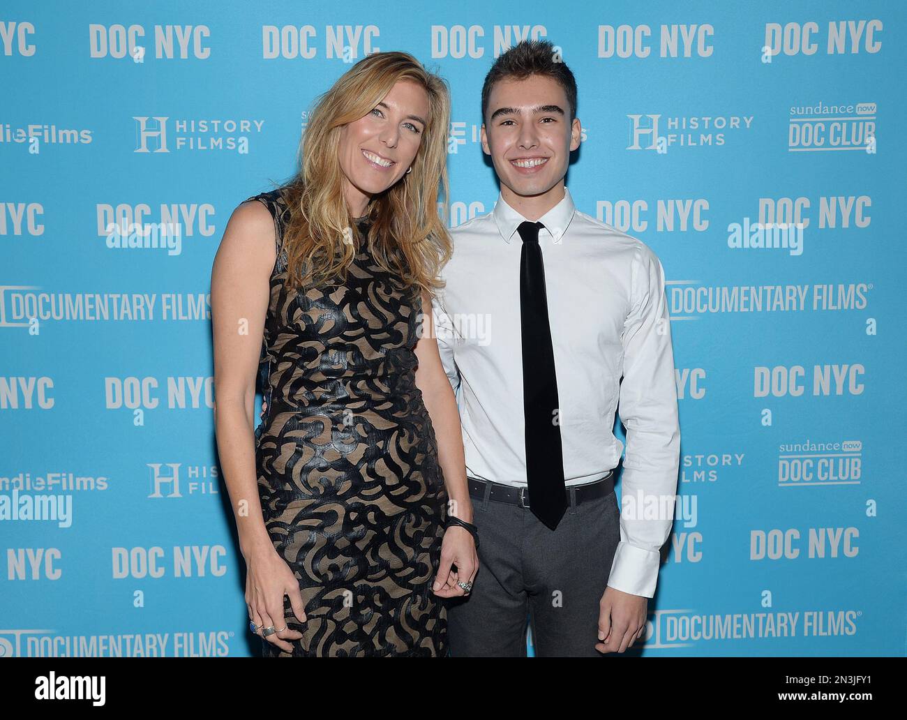 Director Amy Berg poses with Evan Henzi from the film, at the world ...