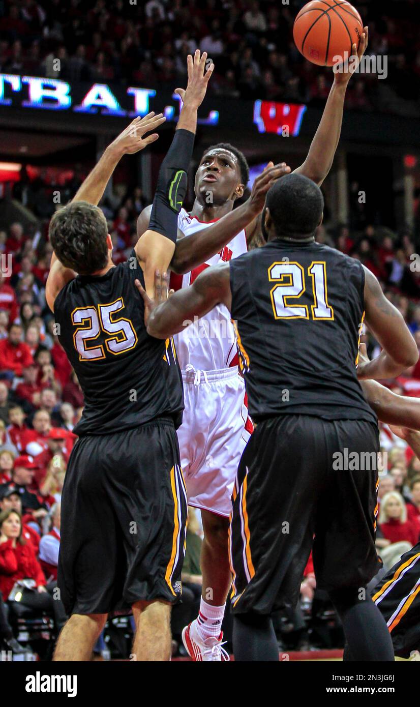 Wisconsin's Nigel Hayes, center, shoots between Northern Kentucky's ...