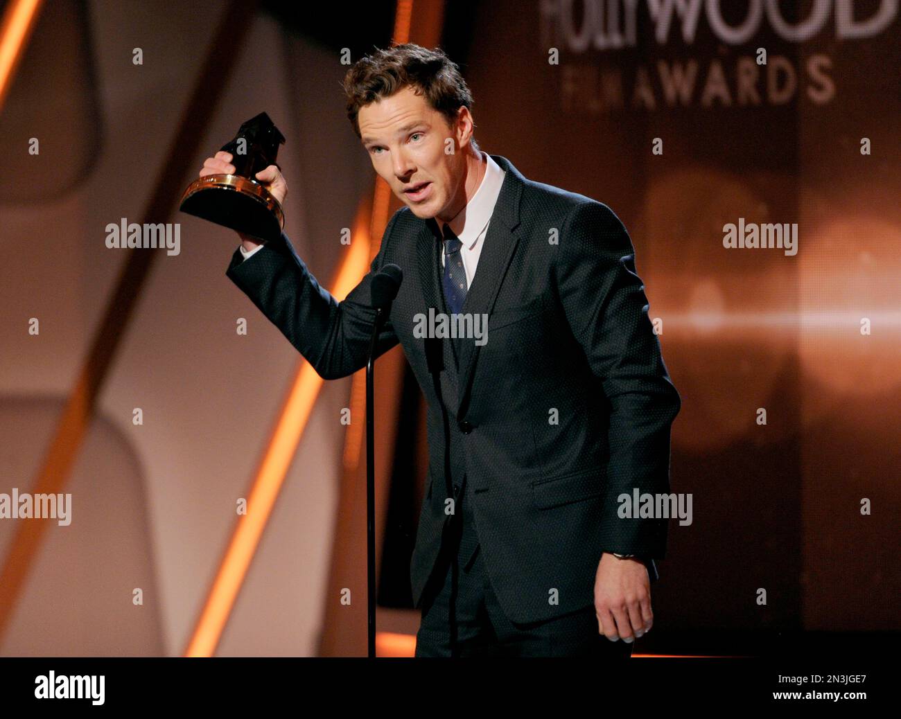 Benedict Cumberbatch accepts the Hollywood actor award on stage at the Hollywood Film Awards at ...