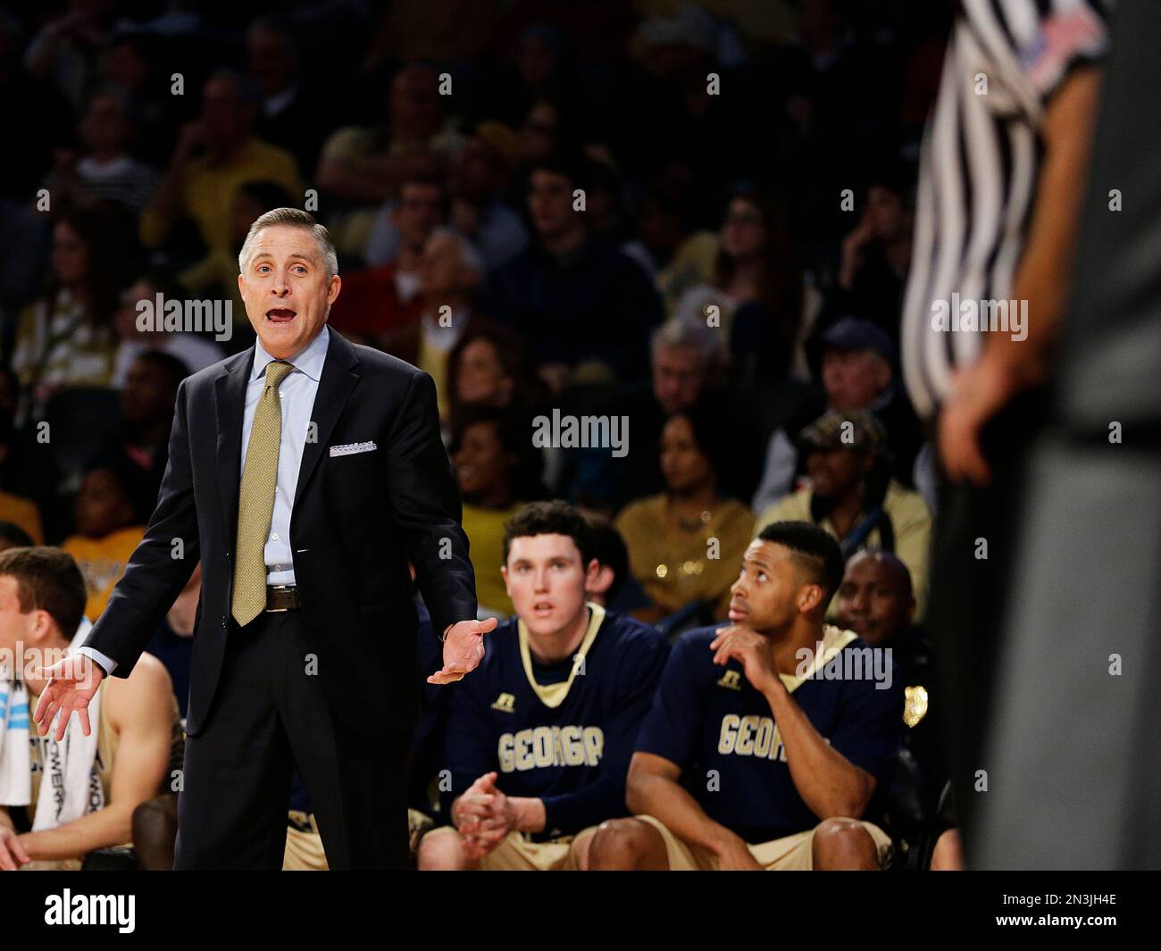 Georgia Tech head coach Brian Gregory argues with an official in the ...