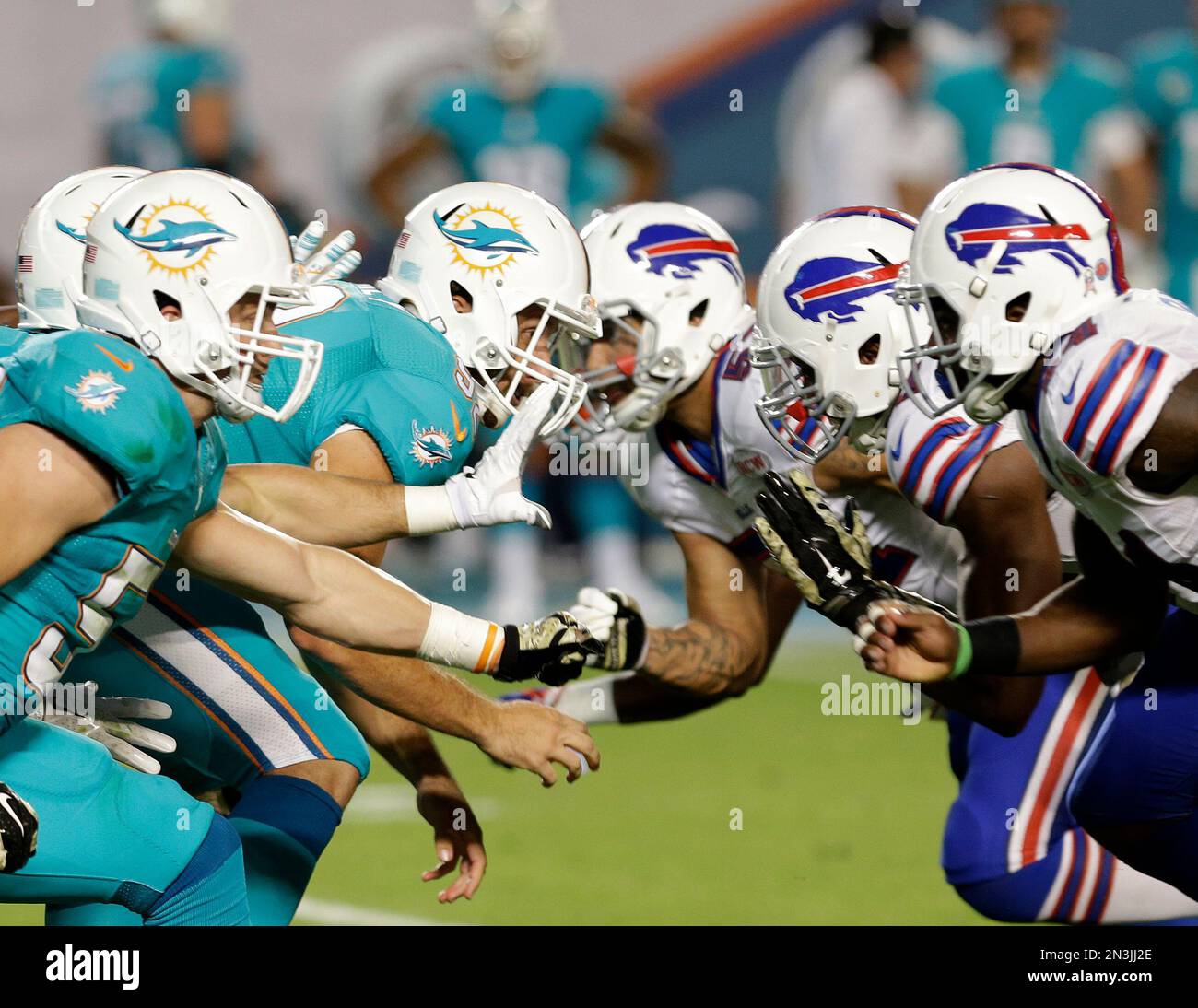 Miami Dolphins and Buffalo Bills players clash during the second half ...
