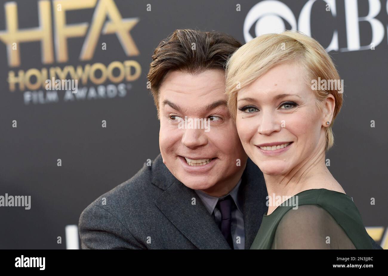 Mike Myers, left, and Kelly Tisdale arrive at the Hollywood Film Awards ...