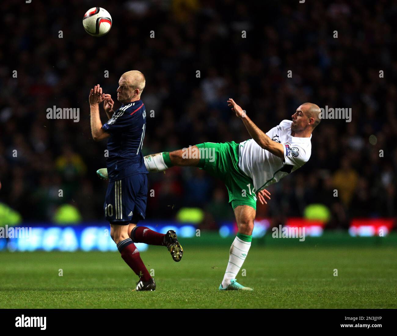 Scotland's Steven Naismith, left, with Ireland's Darron Gibson, right ...