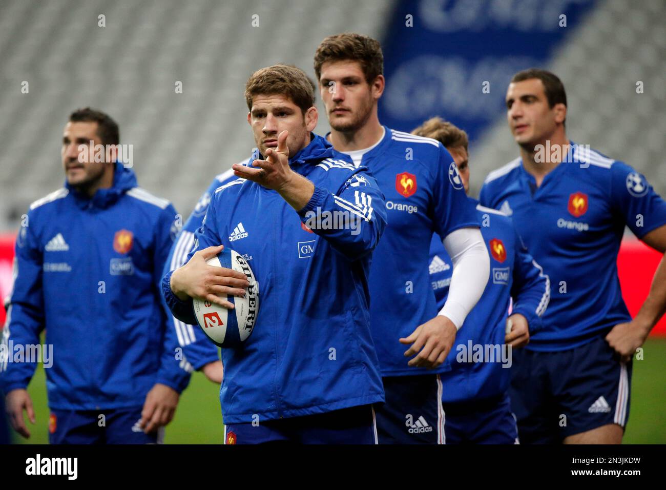 France rugby team player Pascal Pape, front center, holding the ball ...